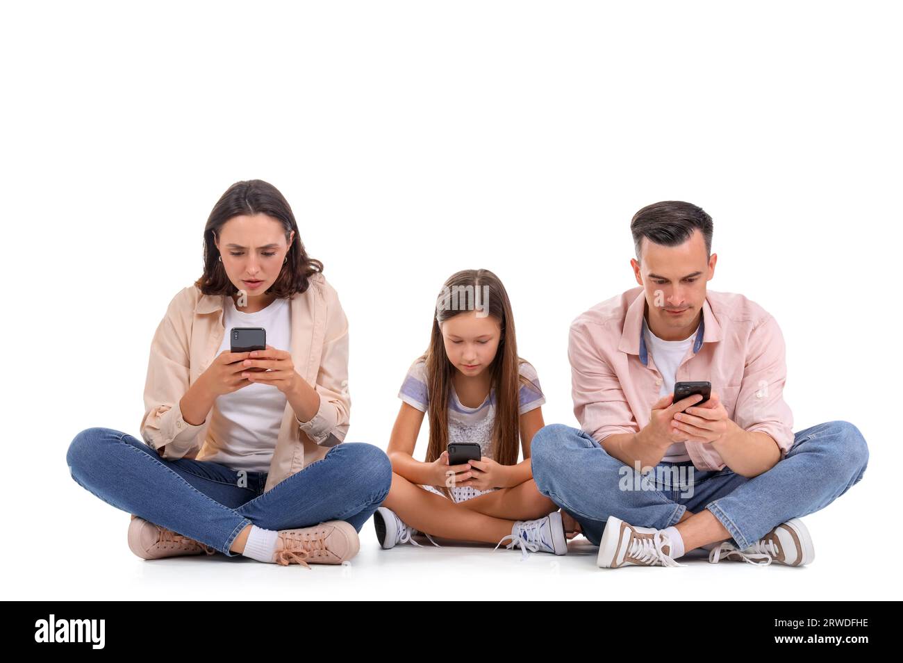 Happy family with mobile phones isolated on white background Stock ...