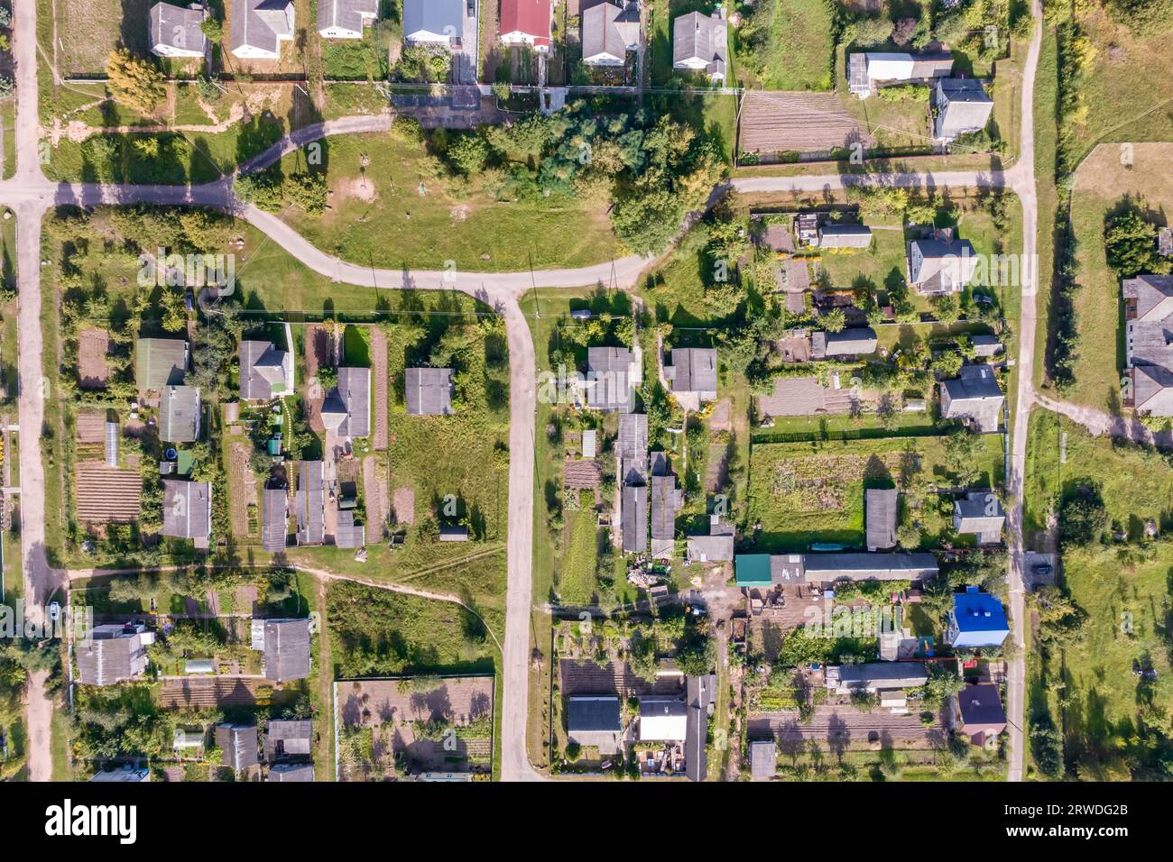 panoramic aerial view of small provincial town or big eco village with ...