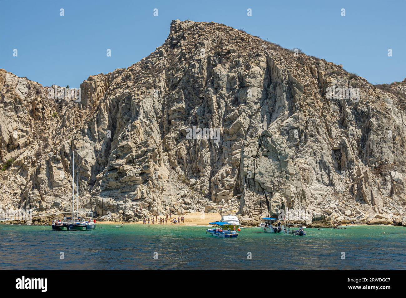 Mexico, Cabo San Lucas - July 16, 2023: Small beach, plenty of bathers ...