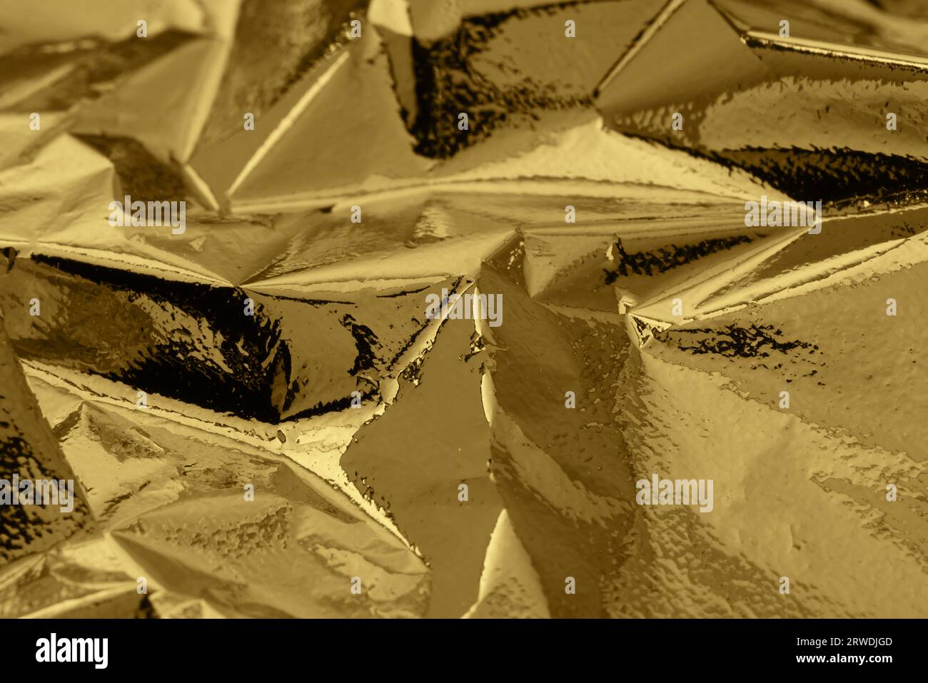 Edible gold leaf sheet as background, closeup Stock Photo - Alamy