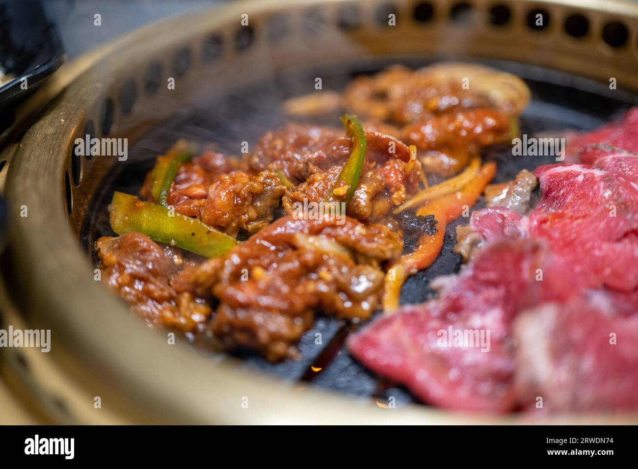 Macro Photo of Korean BBQ with meat cooking on the grill Stock Photo ...