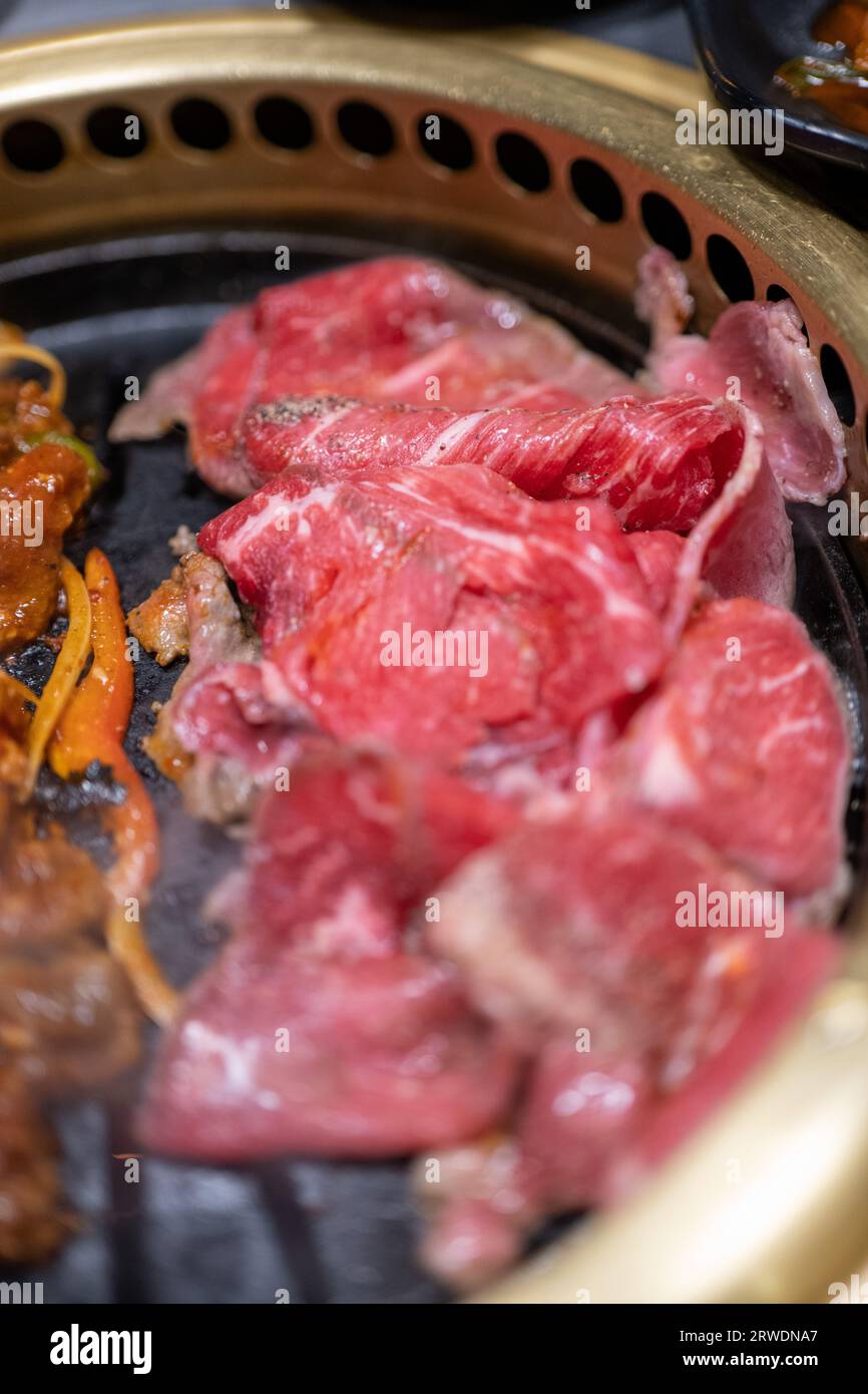 Raw sliced beef cooking hi-res stock photography and images - Alamy