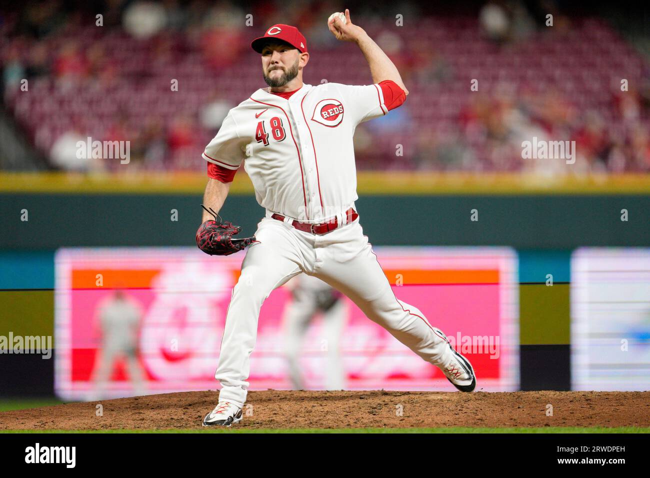 Cincinnati Reds relief pitcher Alex Young throws against the Minnesota ...