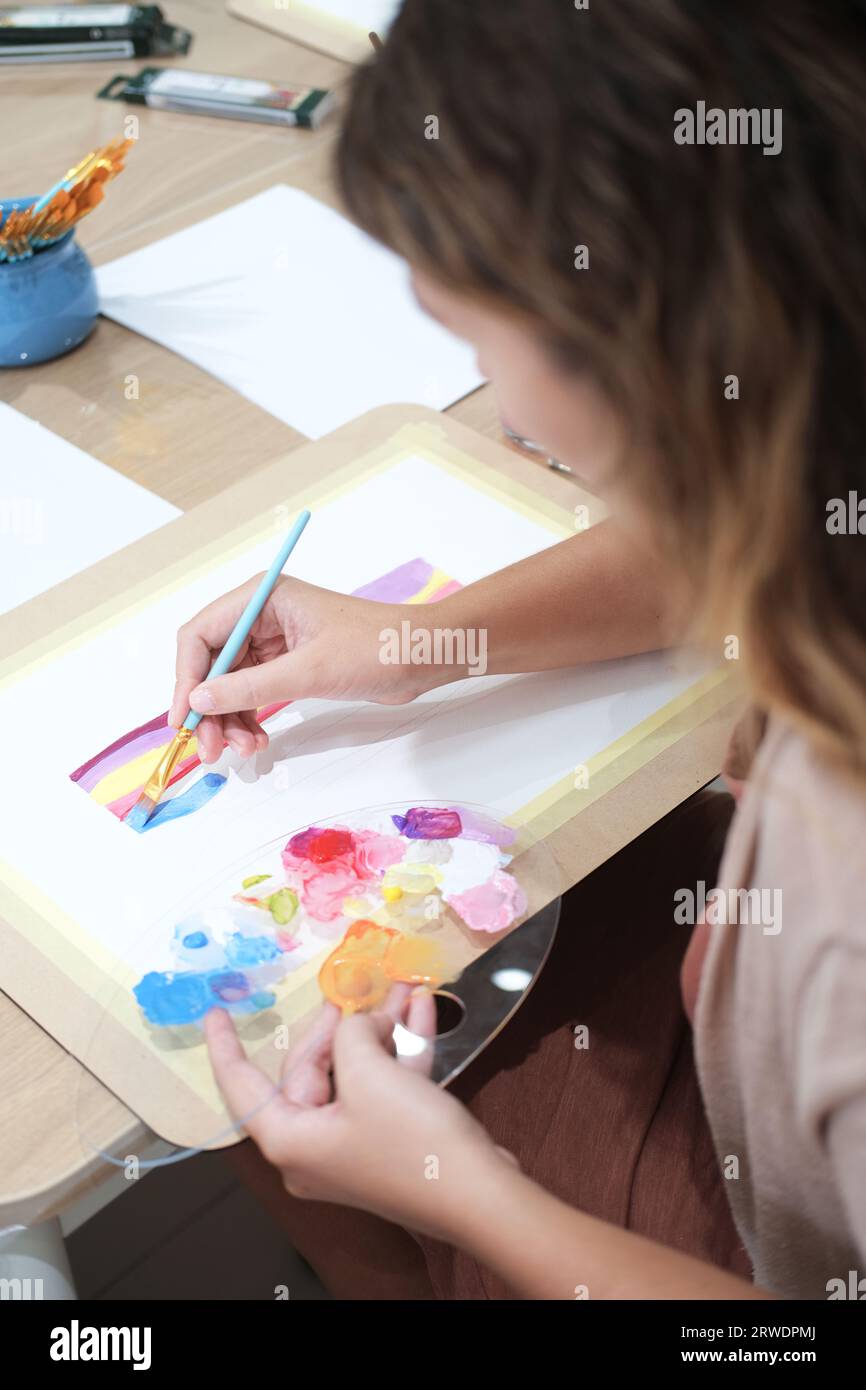 Learning to paint with acrylic paints, master class in an art studio ...