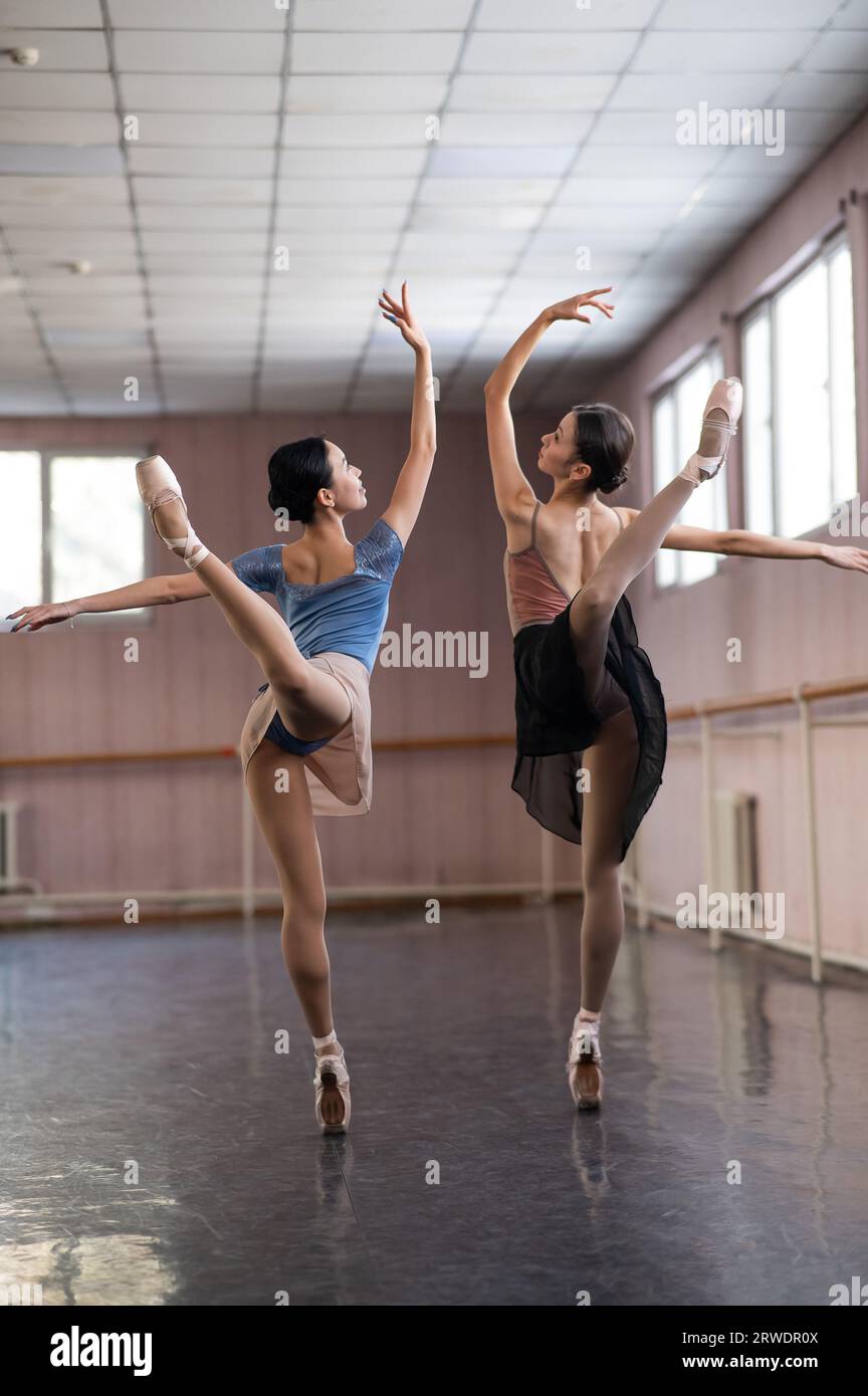 Two Asian ballerinas are dancing in the class Stock Photo - Alamy