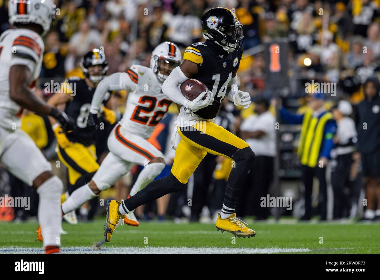 Pittsburgh Steelers wide receiver George Pickens (14) runs after the ...