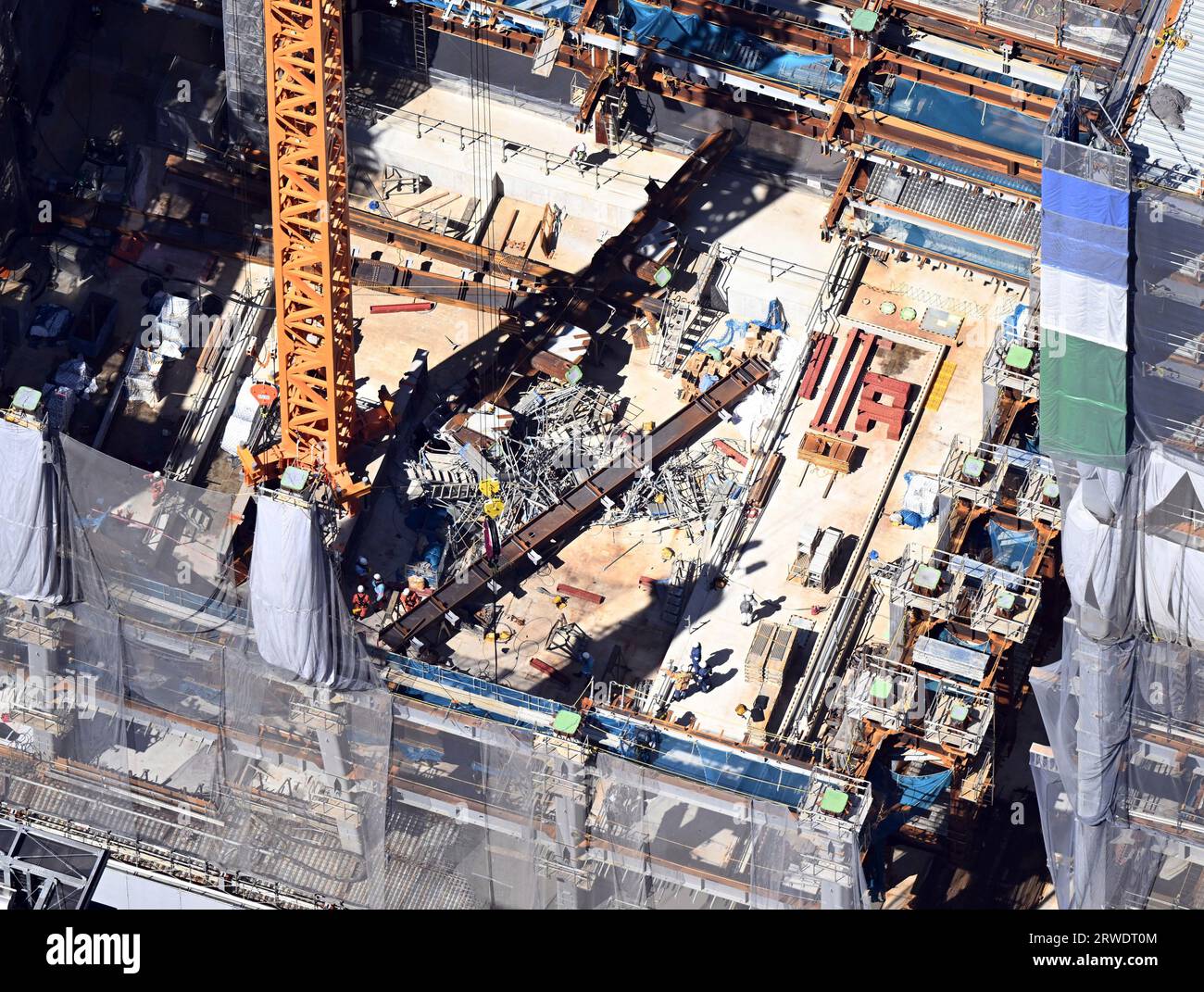 An aerial photo shows an accident scene where five workers fell along ...