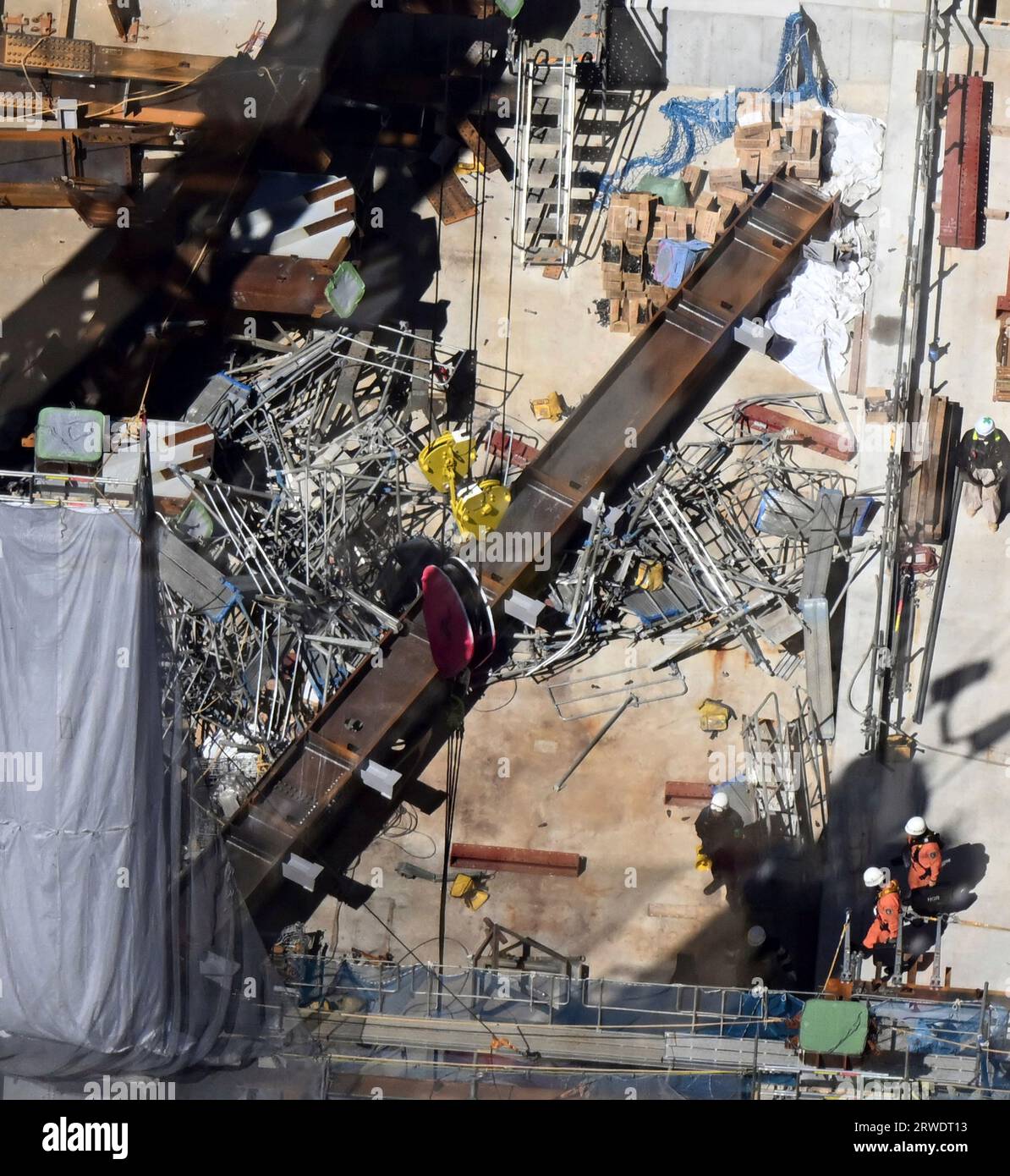 An aerial photo shows an accident scene where five workers fell along ...