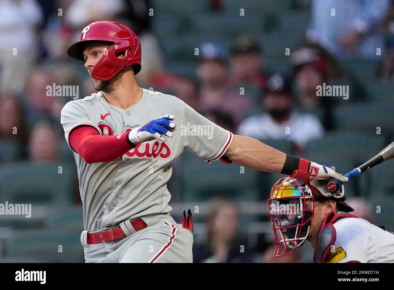 Philadelphia Phillies' Trea Turner follows through on a single in the ...