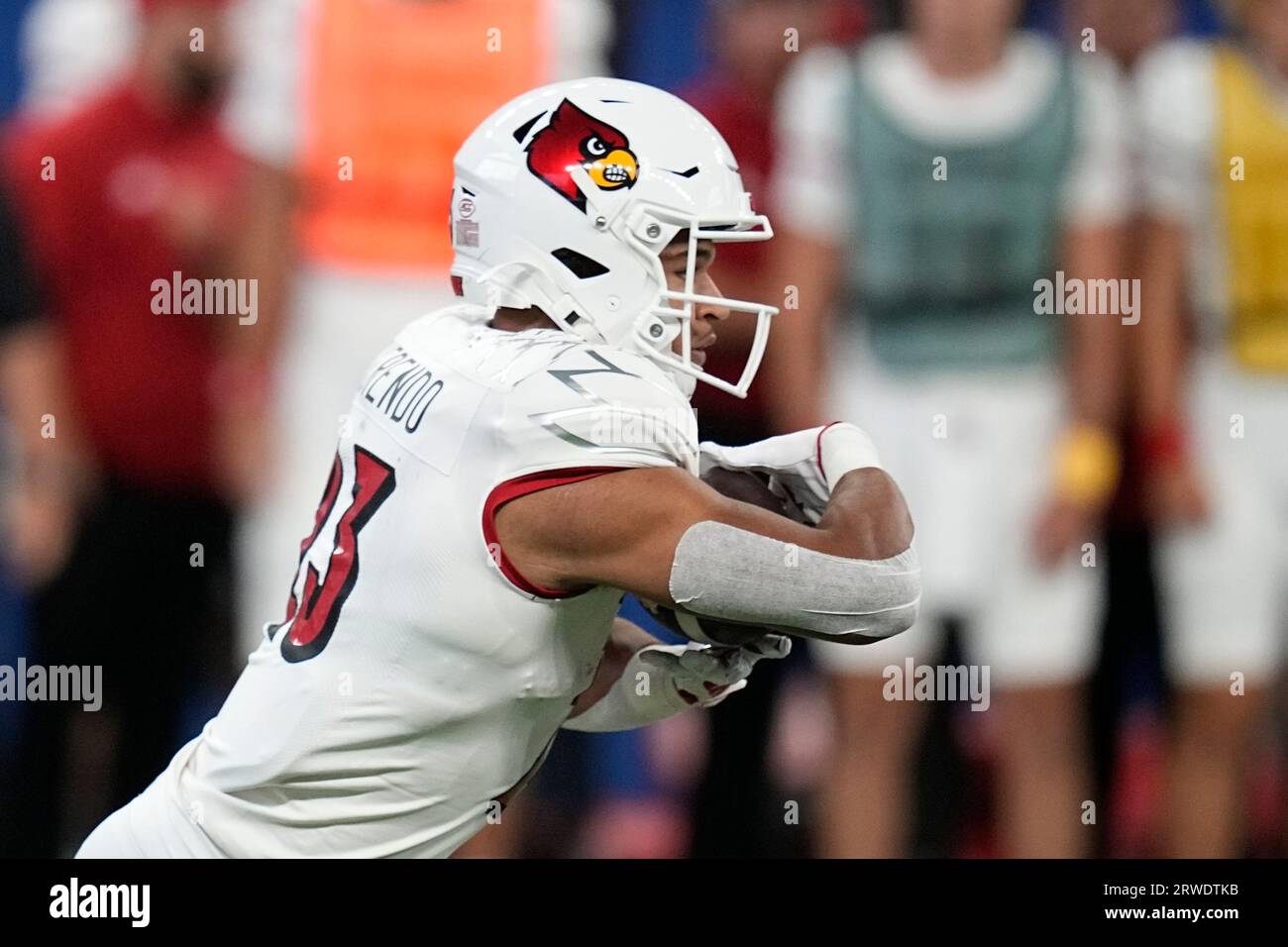 Louisville running back Isaac Guerendo runs during the first half of an ...