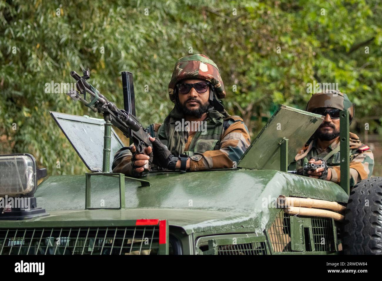 Indian security forces personnel stand hi-res stock photography and ...