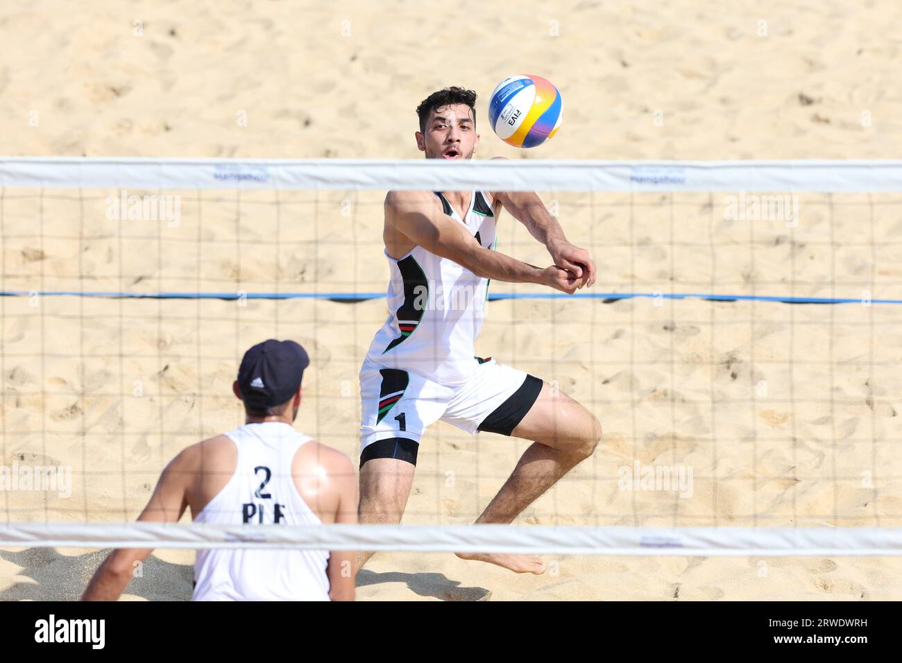 Ningbo, China's Zhejiang Province. 19th Sep, 2023. Abdallah Alarqan (R ...