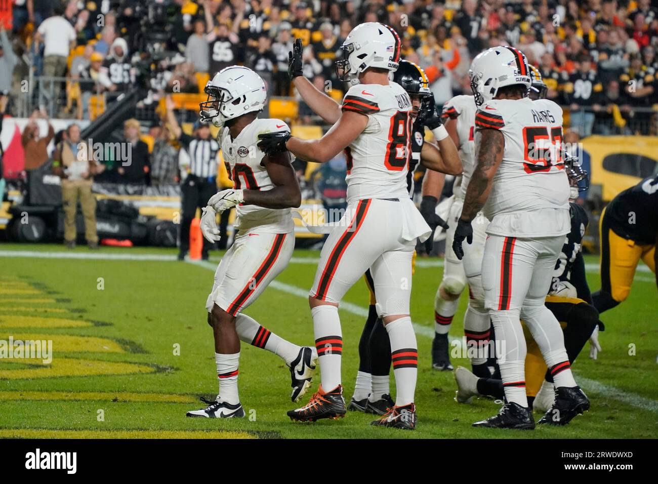 Cleveland Browns running back Pierre Strong Jr., left, celebrates in ...