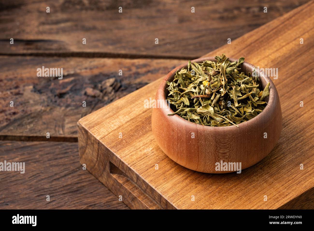 Dehydrated rue leaves in the bowl - Ruta graveolens Stock Photo - Alamy