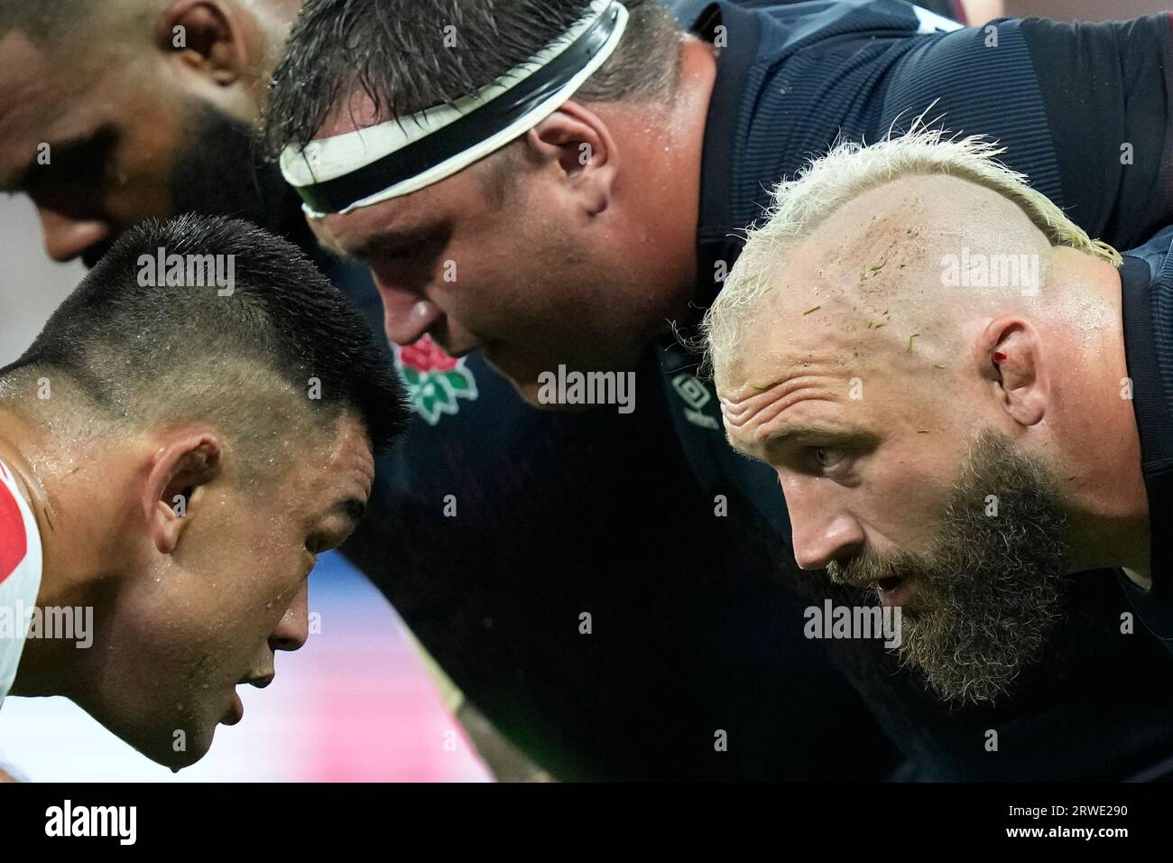 England's Joe Marler, right looks at his counterpart Japan's Jiwon Gu ...