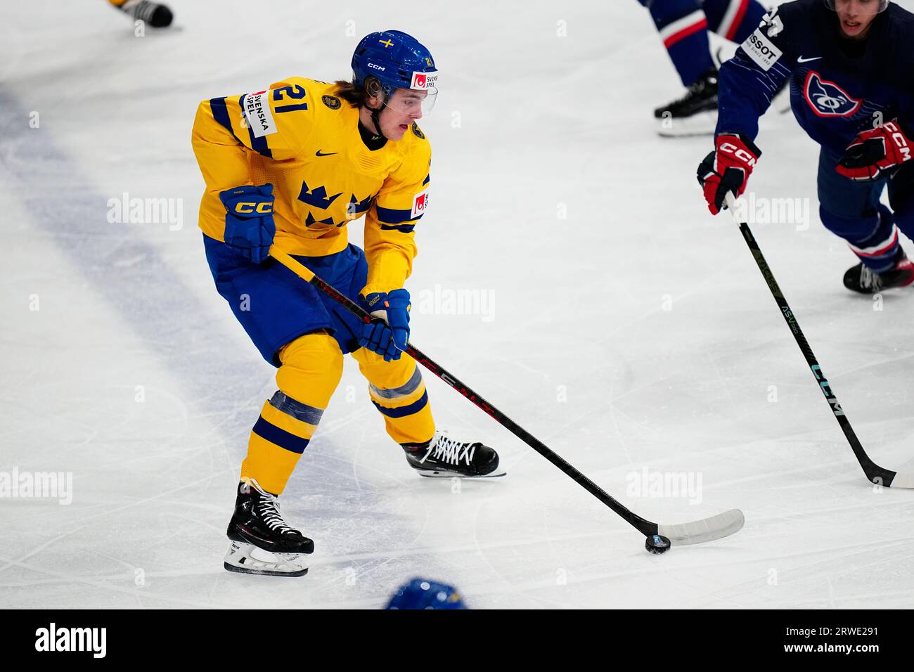 FILE - Sweden's Leo Carlsson controls the puck during the group A match ...
