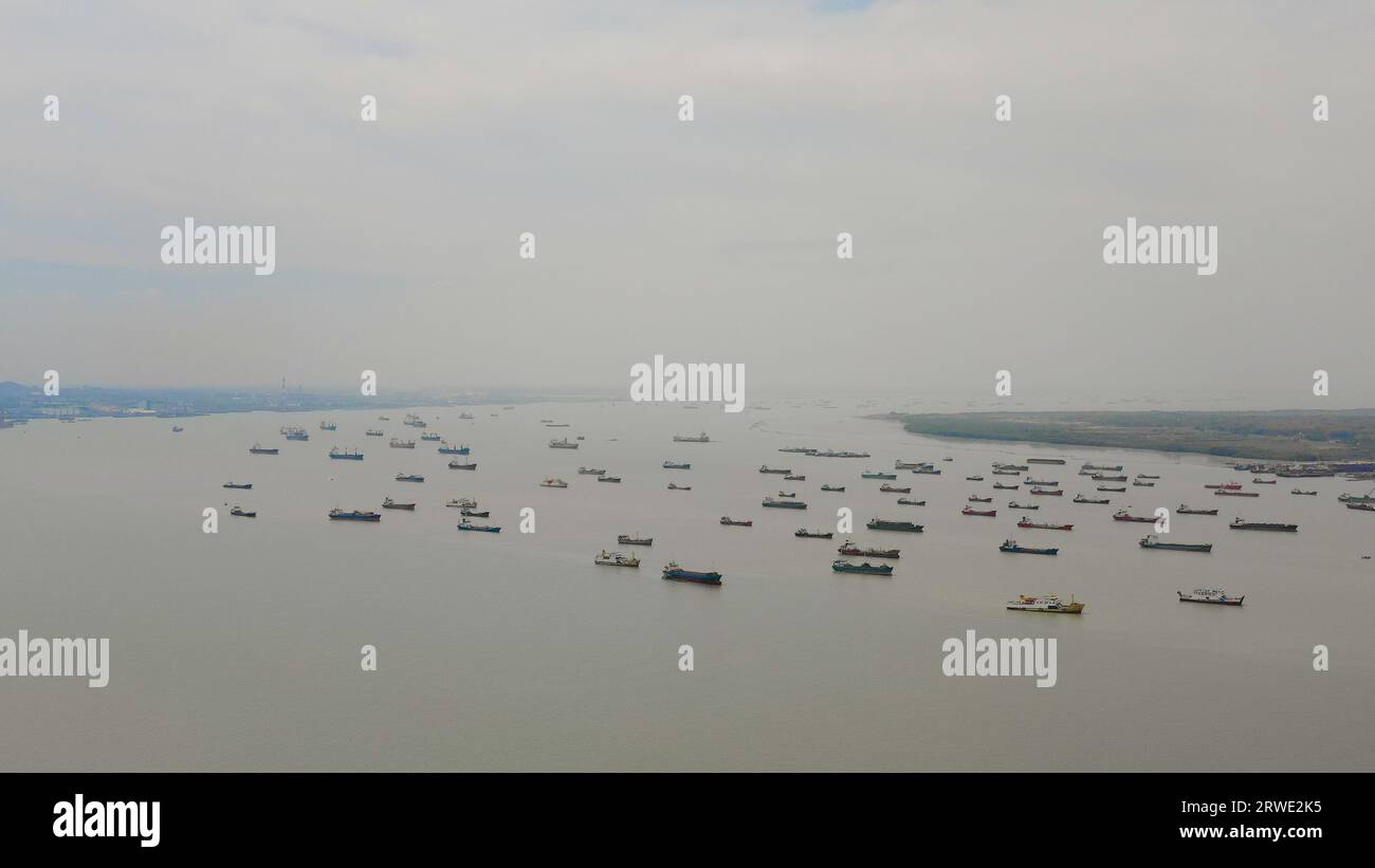 aerial view cargo and passenger seaport with ships Tanjung Perak ...
