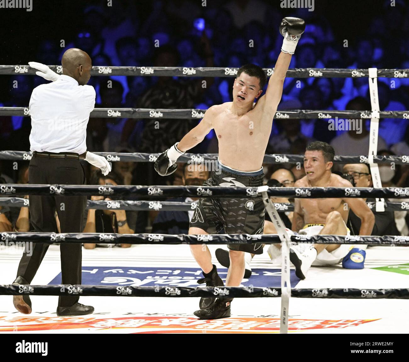 Former kickboxer Tenshin Nasukawa of Japan raises his arm in triumph ...