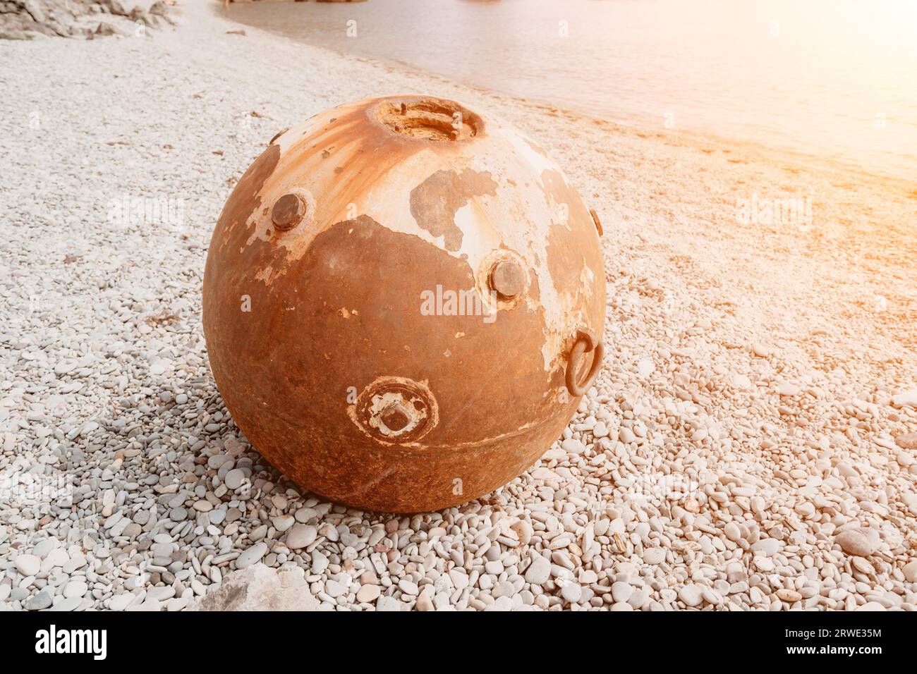 Old rusty sea mine on the beach Stock Photo - Alamy