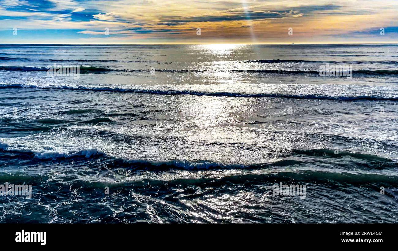 Rays of the sun warming the deep sea of the Pacific Ocean, which is an ...