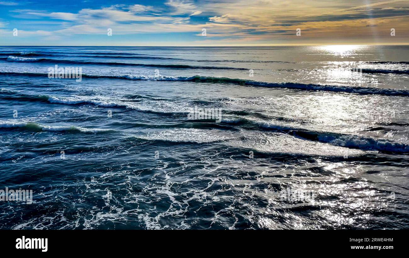 Sunbeams warming the deep sea of the Pacific Ocean, which is an immense ...