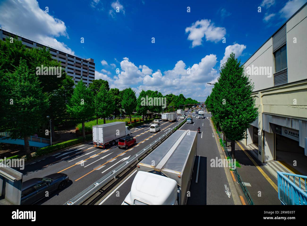 A traffic jam at the downtown street in Takashimadaira Tokyo wide shot ...