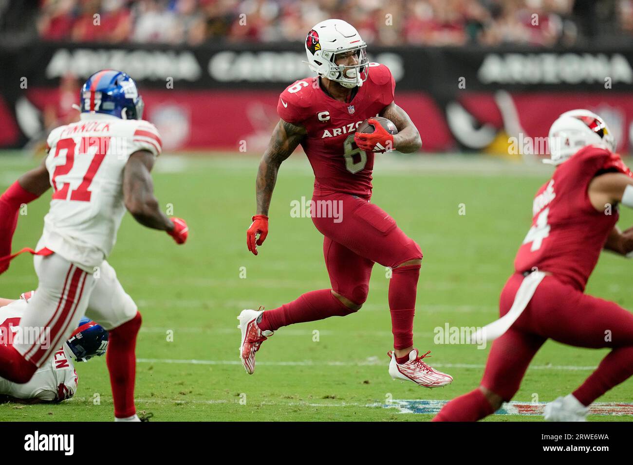 Arizona Cardinals running back James Conner (6) runs with the ball as ...