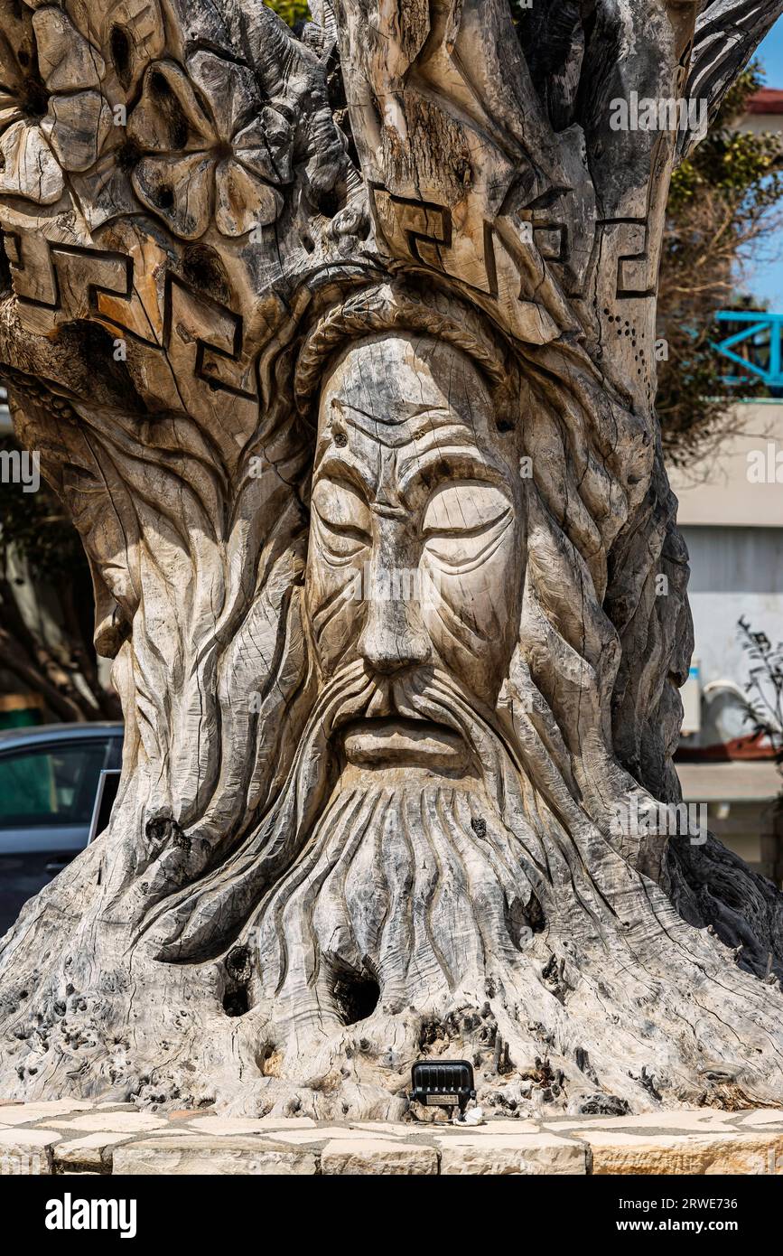 Tree with carvings in Matala, Crete, Greece Stock Photo - Alamy
