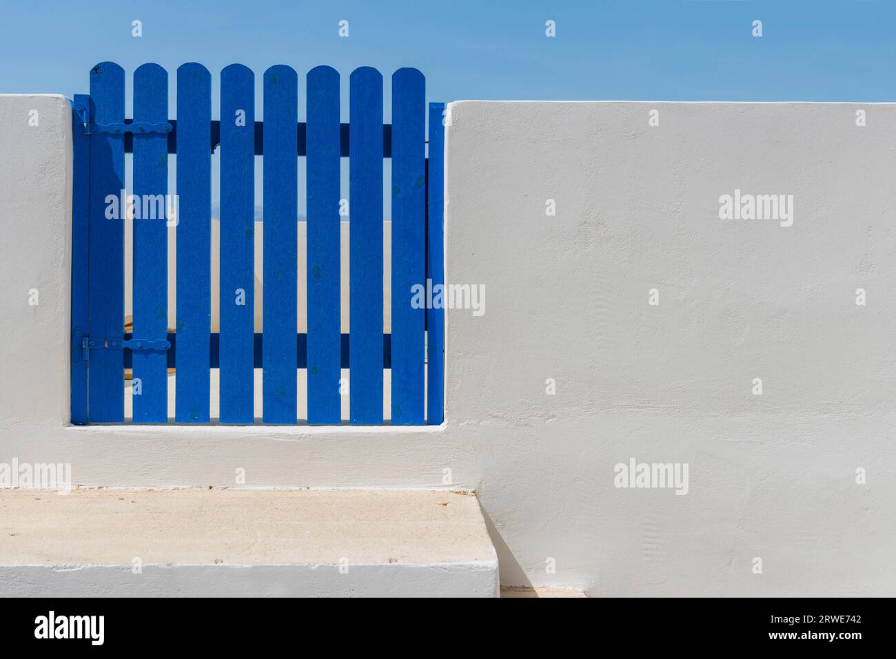 Blue fence with white wall, blue, fence, on Crete, symbolising Greece ...