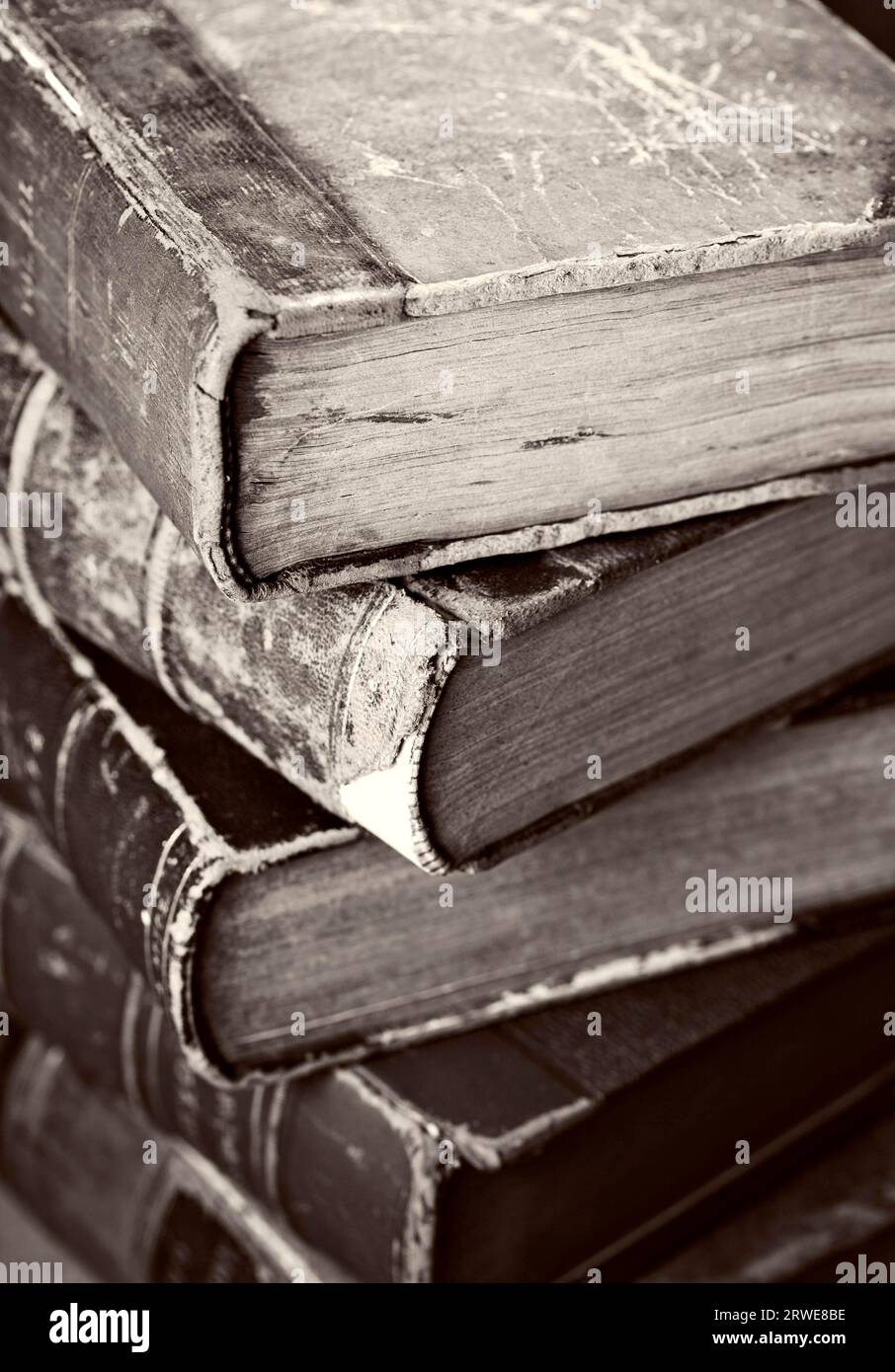 Sepia toned image of a stack of old worn books Stock Photo - Alamy