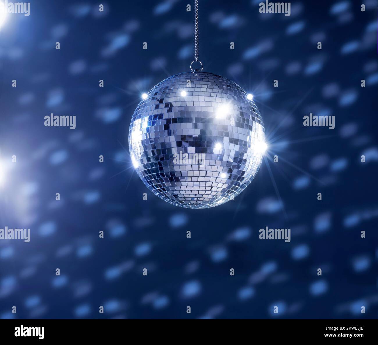A mirror ball hanging from the ceiling Stock Photo - Alamy
