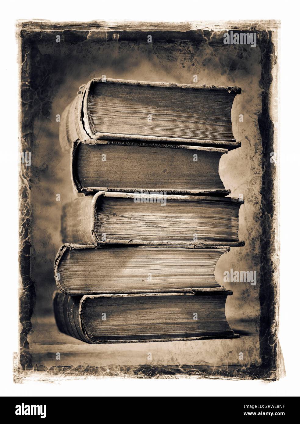 Dirty and stained image of a stack of old books Stock Photo - Alamy