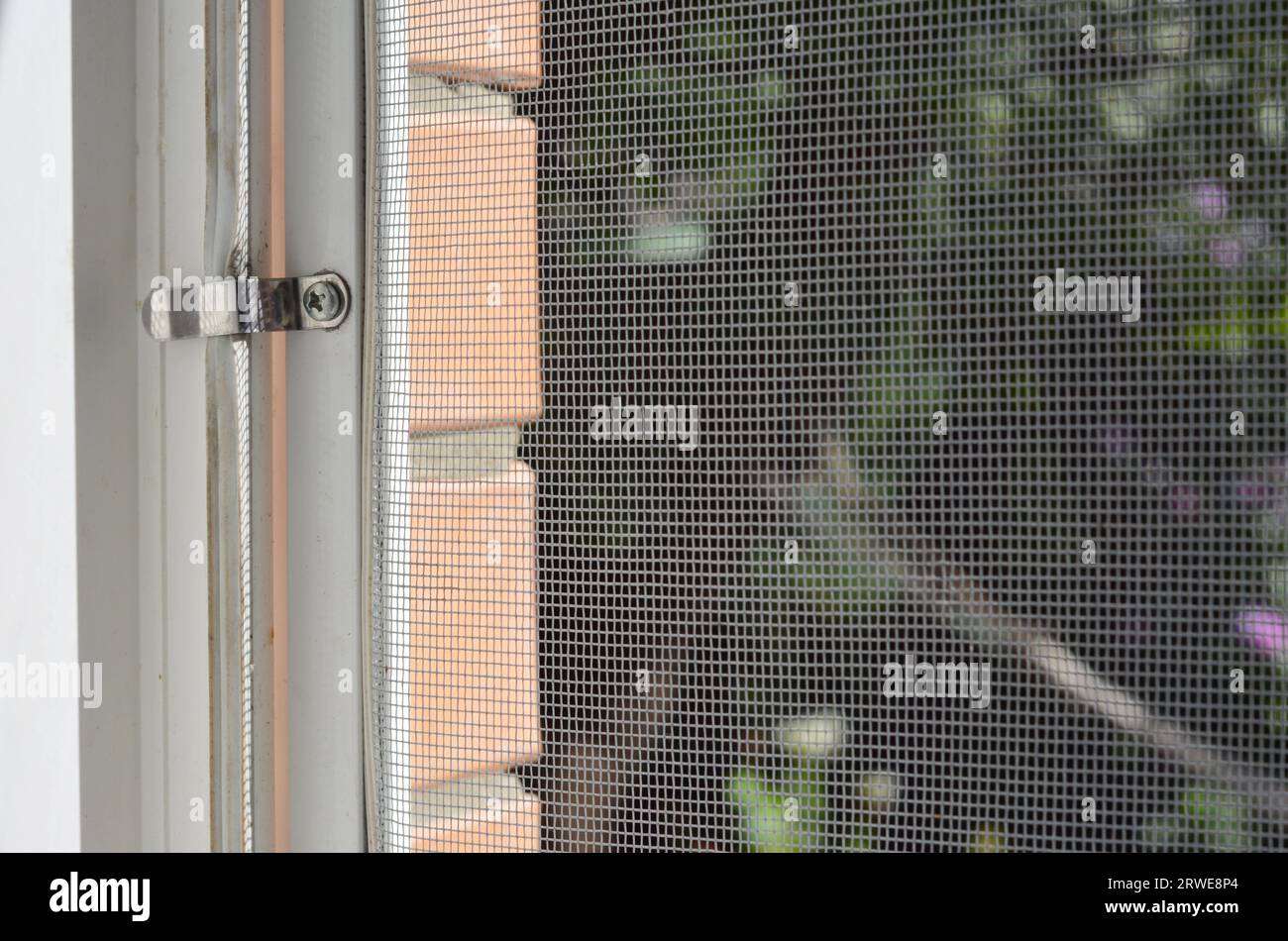 Mosquito screen. Close up on house mosquito wire screen with metal ...