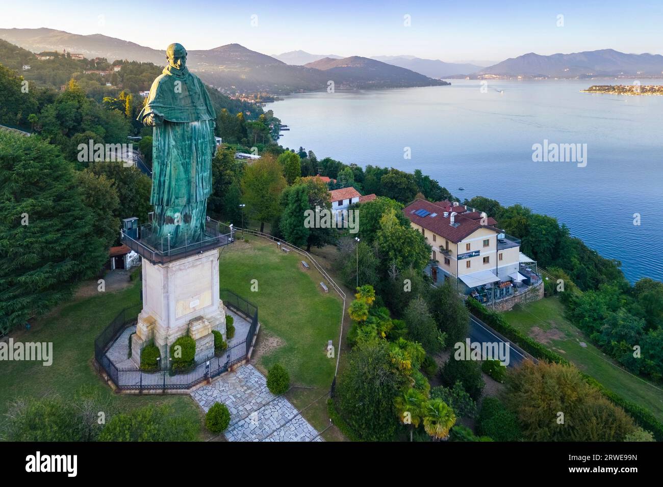 Aerial view of the Statue of San Carlo Borromeo during a summer sunset ...