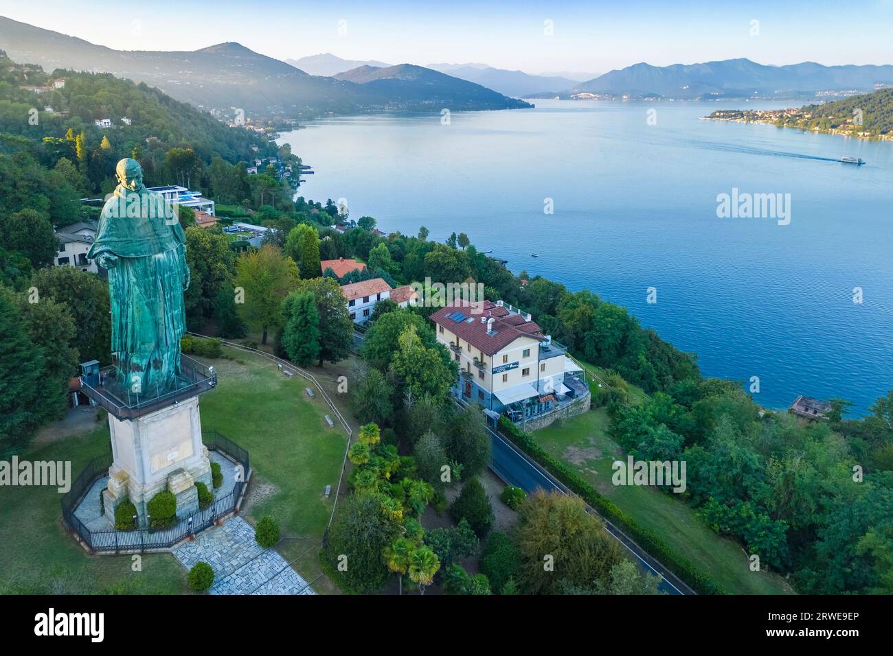 Aerial view of the Statue of San Carlo Borromeo during a summer sunset ...