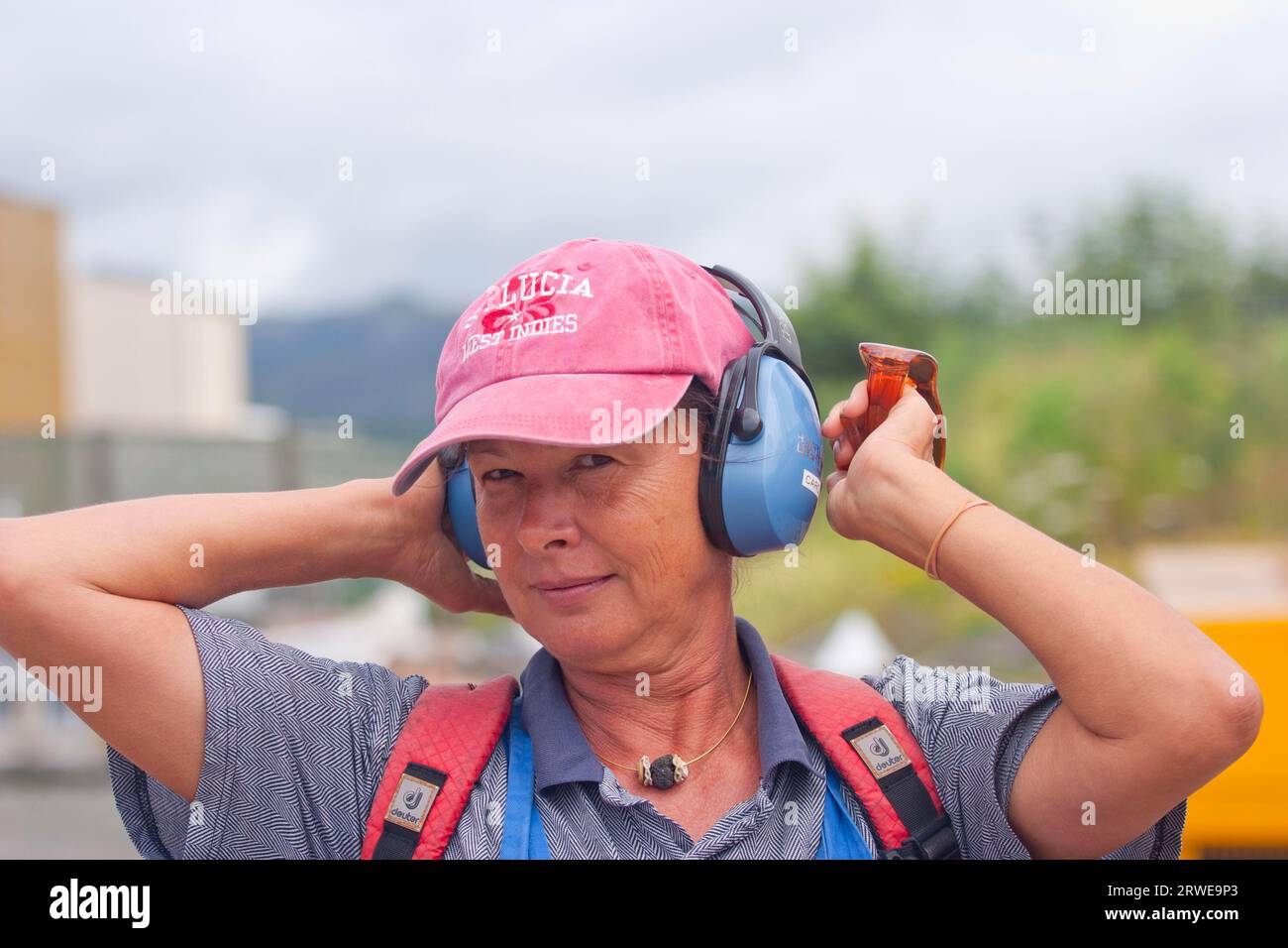 Woman with hearing protection Stock Photo - Alamy
