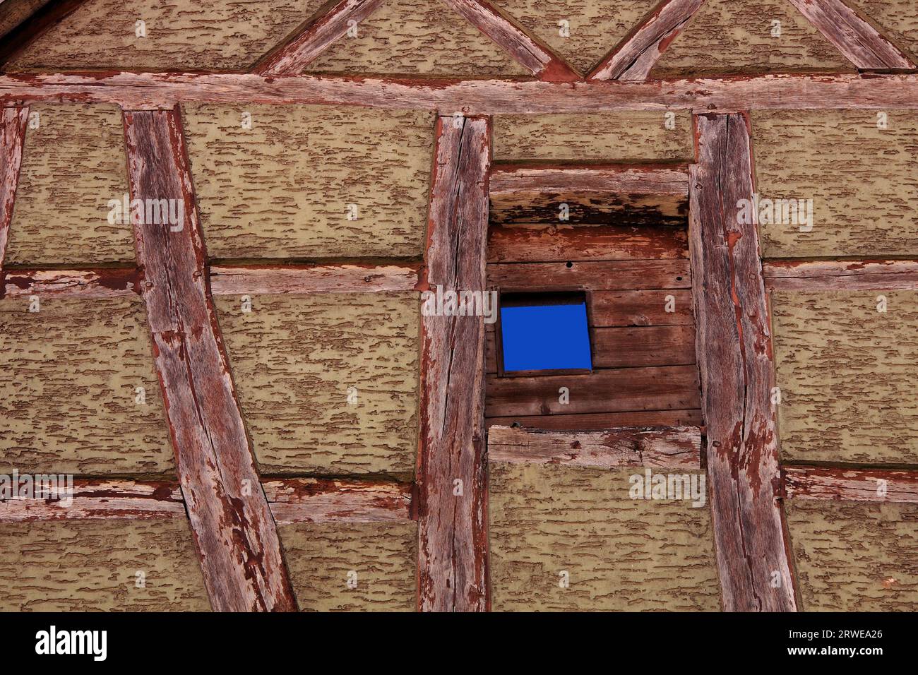 Window with sky reflection in half-timbered house Stock Photo - Alamy