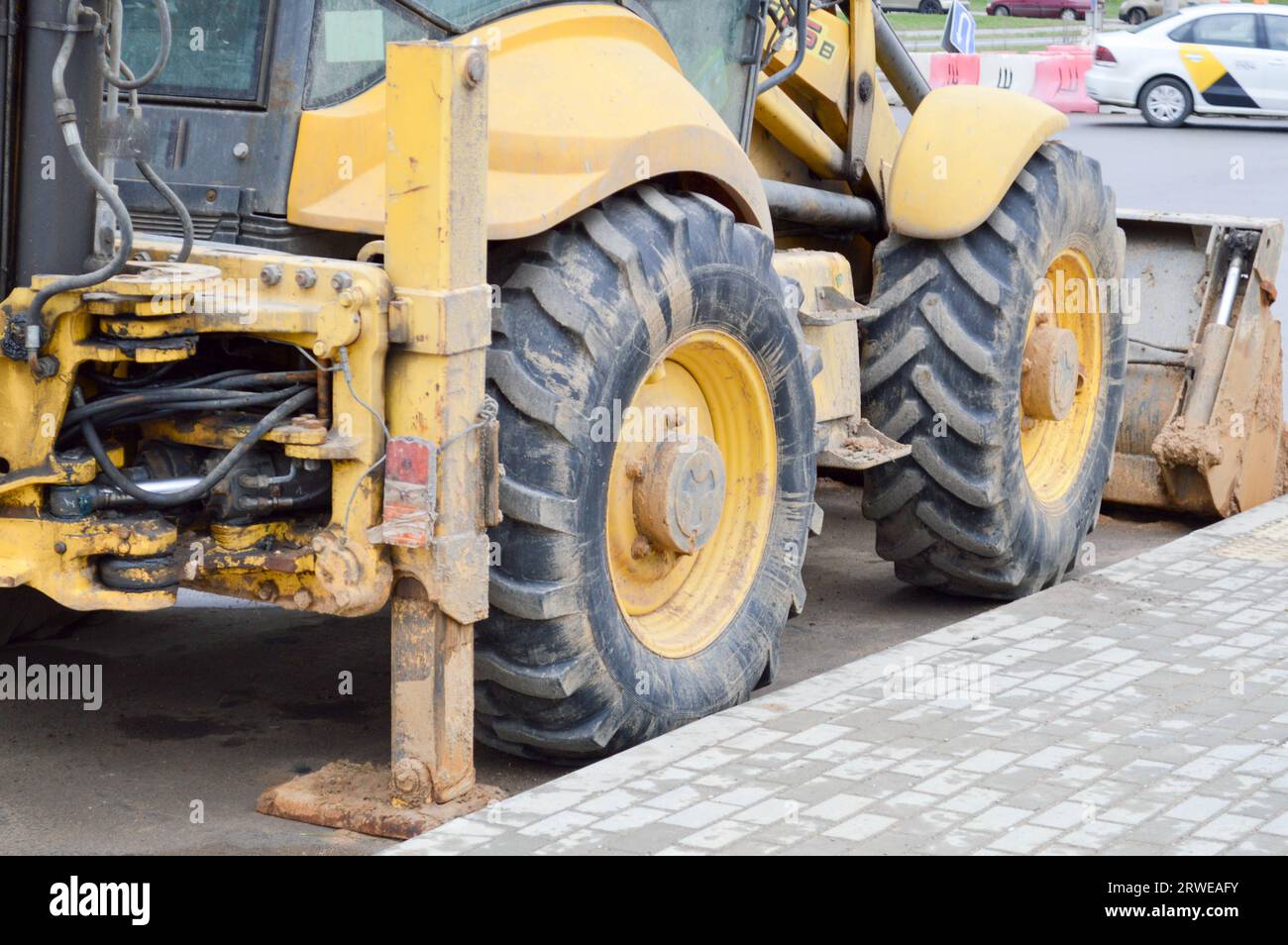 Big bright yellow powerful industrial heavy excavator tractor ...