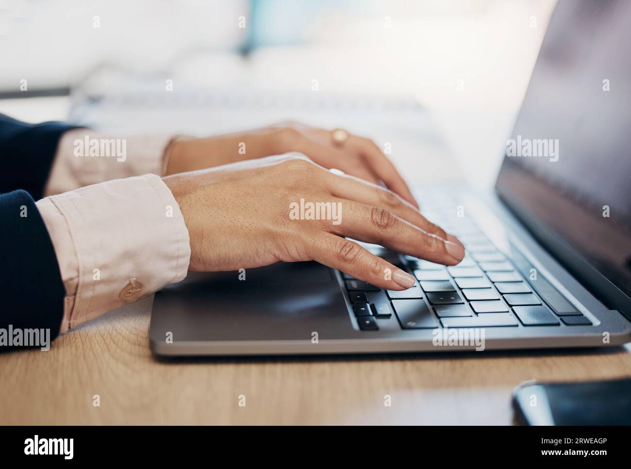 Hands, laptop and typing for business woman, communication and email ...