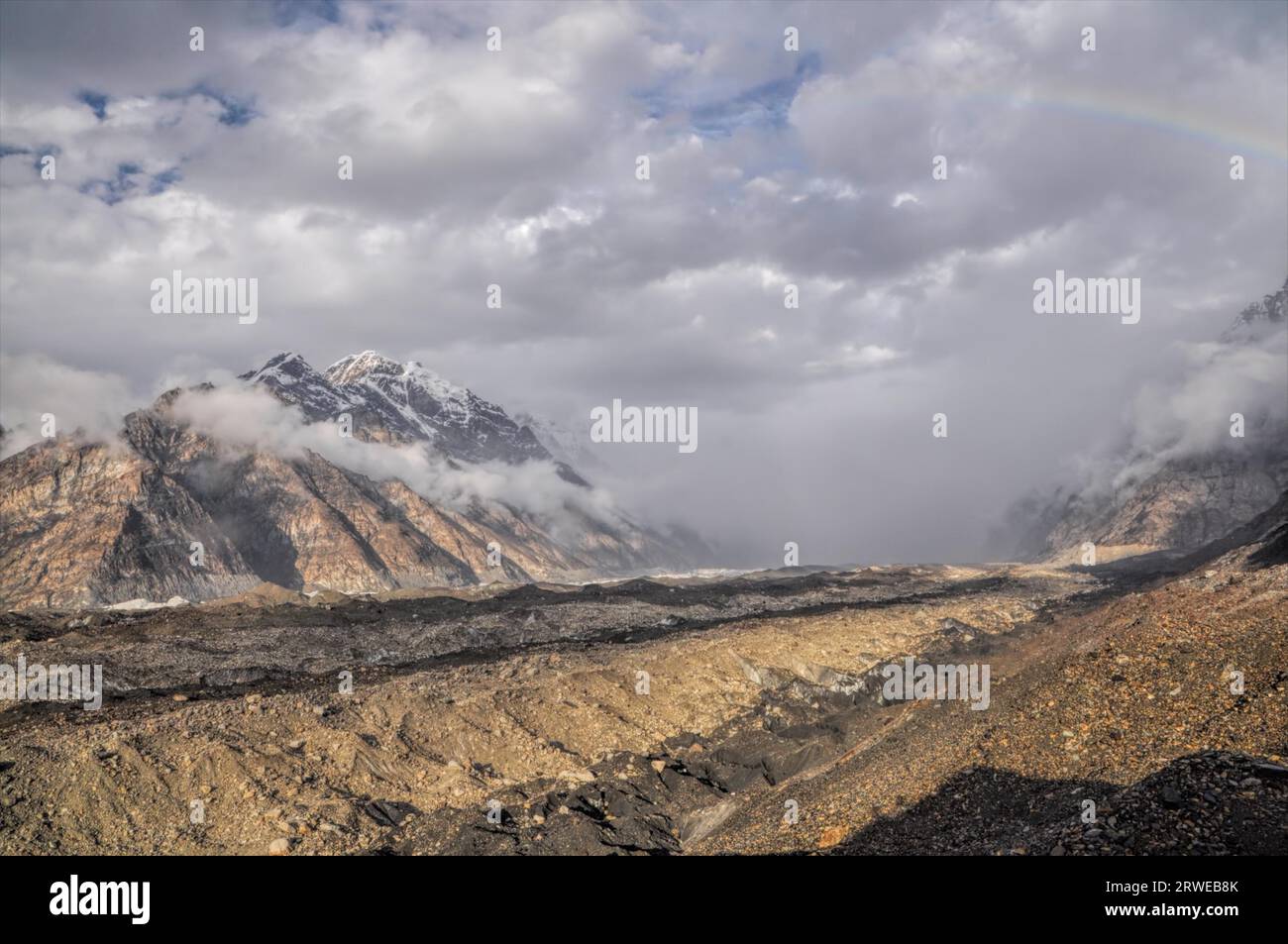 Dramatic clouds forming on Engilchek glacier in Tian Shan mountain ...