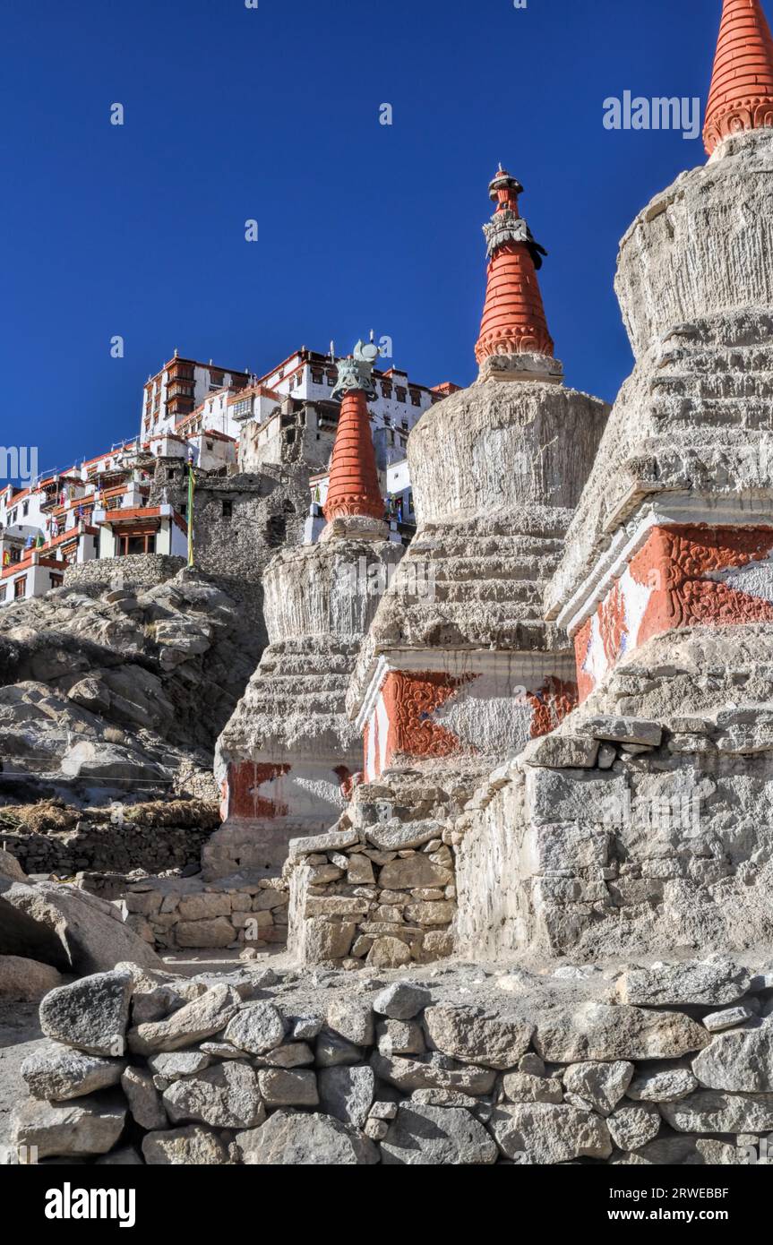 A row of stone monuments at the feet of Chemrey monastery in Ladakh ...