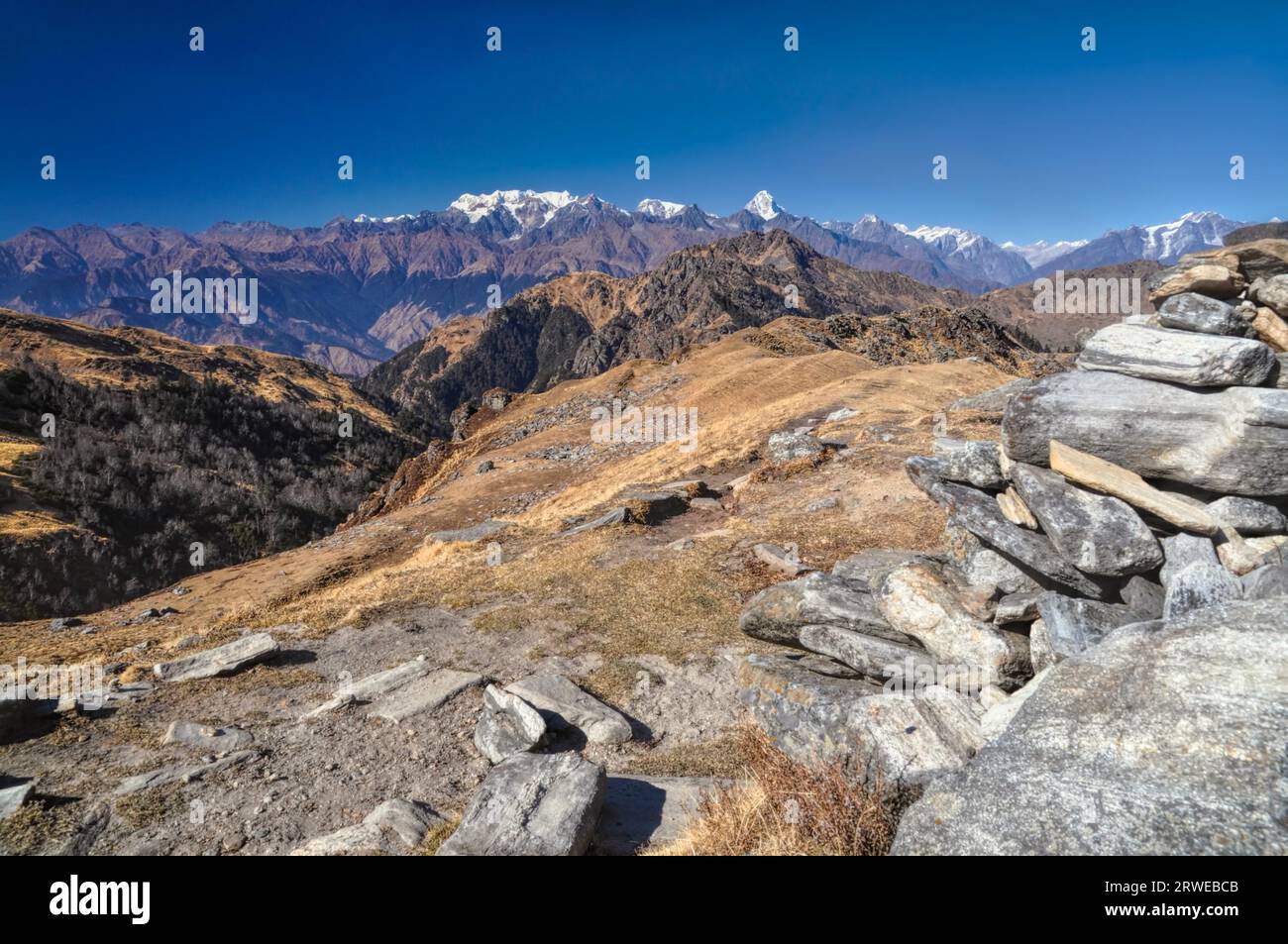 Picturesque view of rocks and peaks in Kuari Pass in India Stock Photo ...