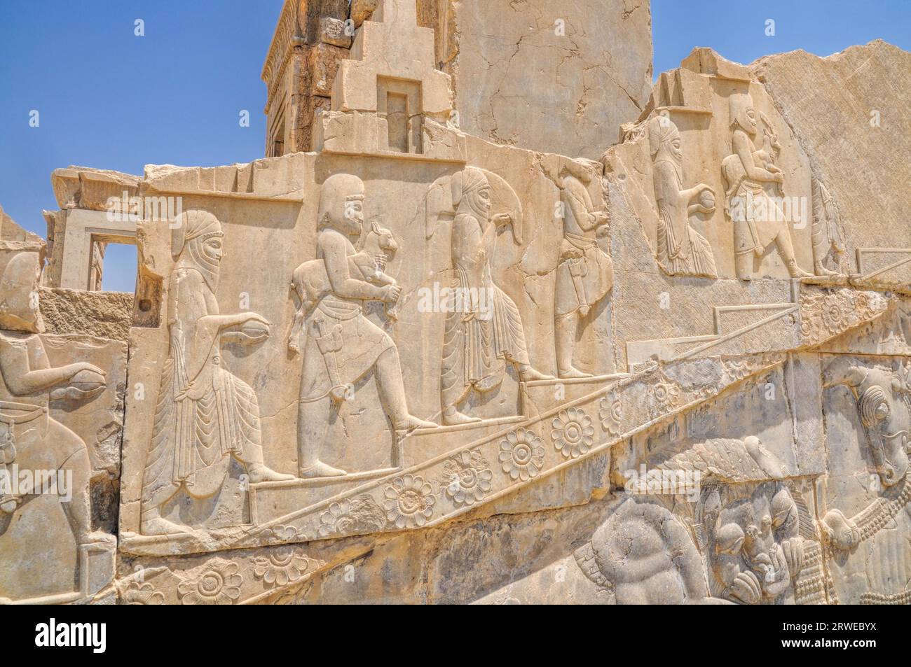 Figures on walls of ancient persian capital Persepolis in current Iran ...