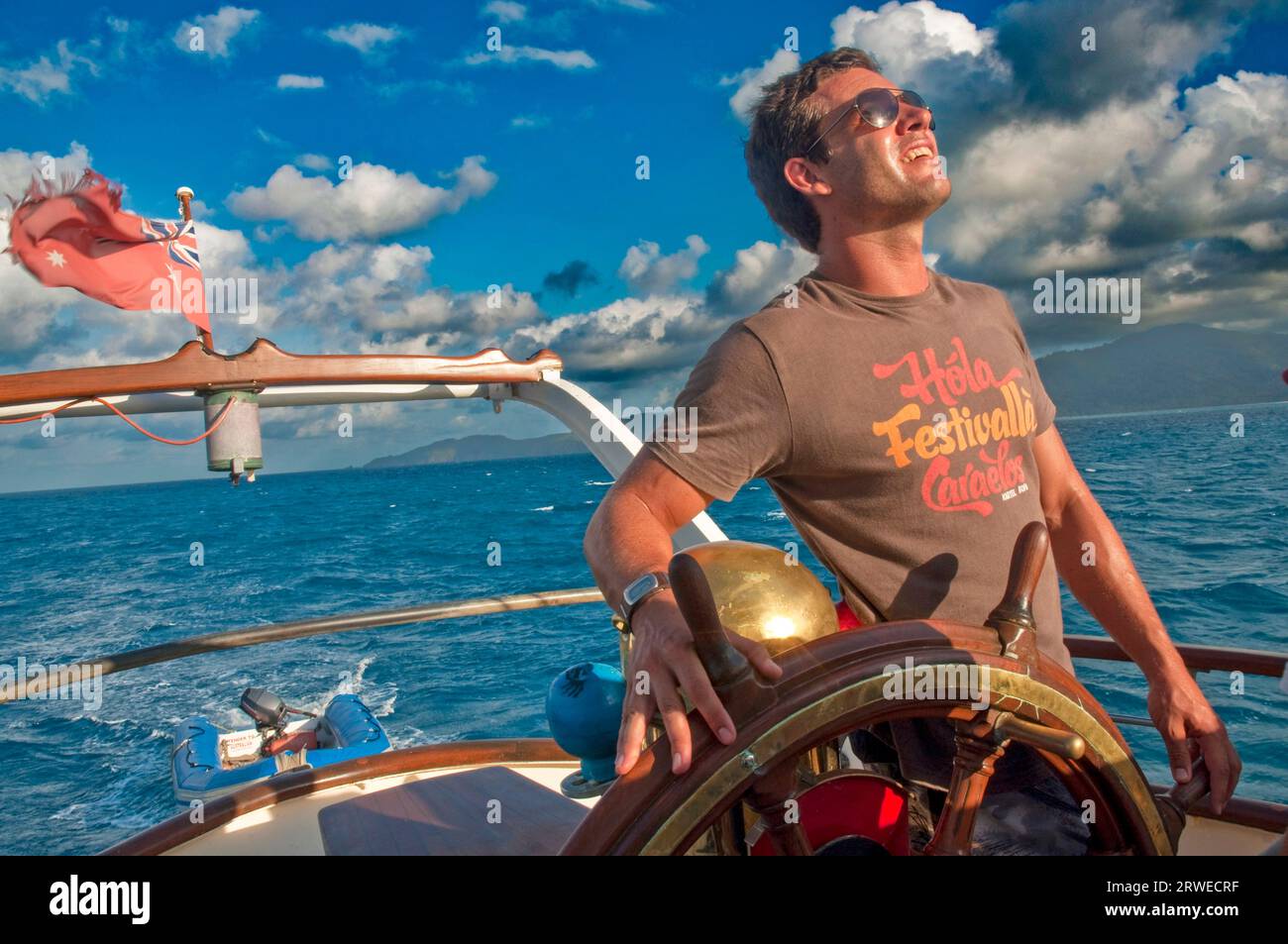 Skipper of charter vessel, The Solway Lass, at the helm in the ...