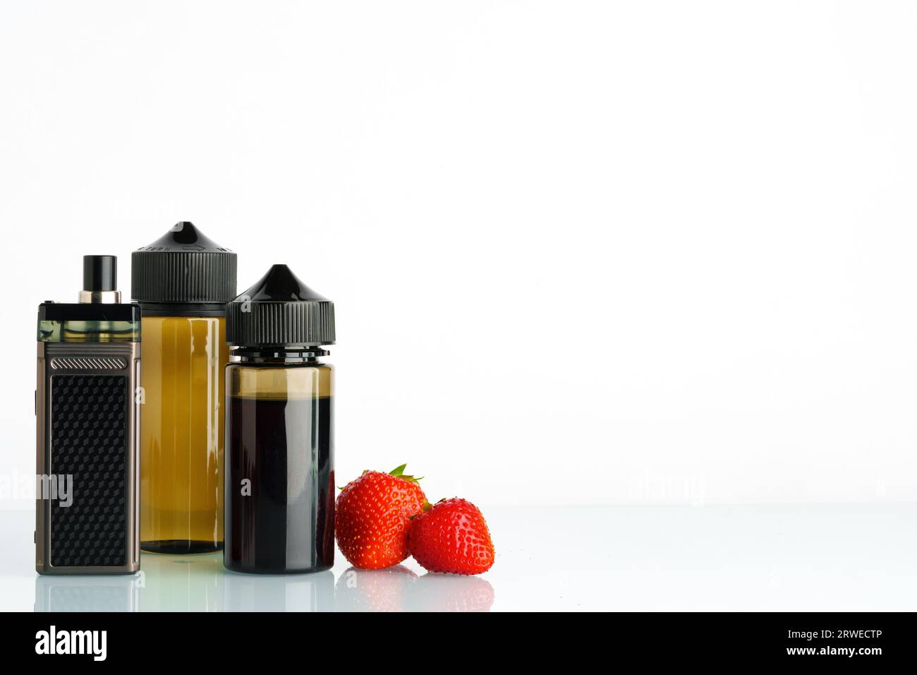 Electronic cigarette liquid with strawberry flavor on white background ...
