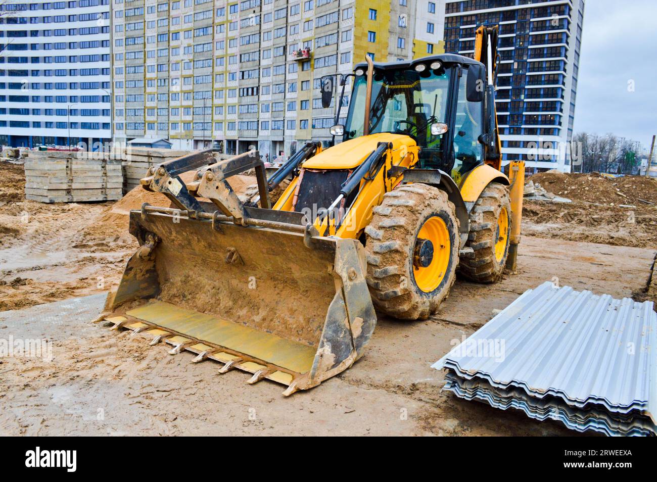 Big bright yellow powerful industrial heavy excavator tractor ...