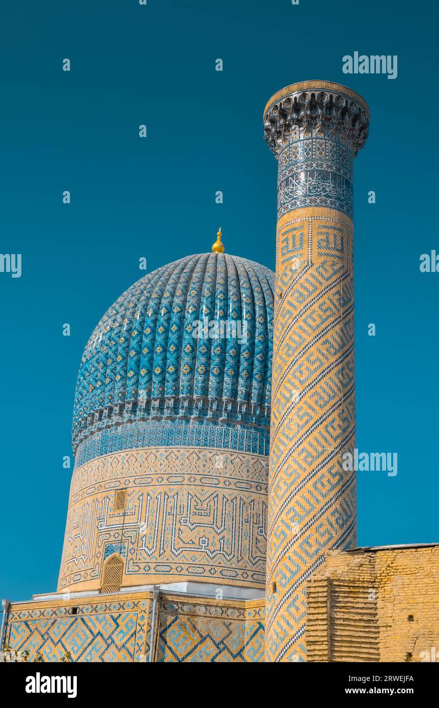 Photo of large building and tower with blue ornaments and patterns in ...