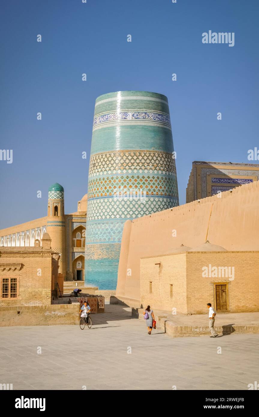Photo of large circular tower with blue ornaments on its bricks in ...