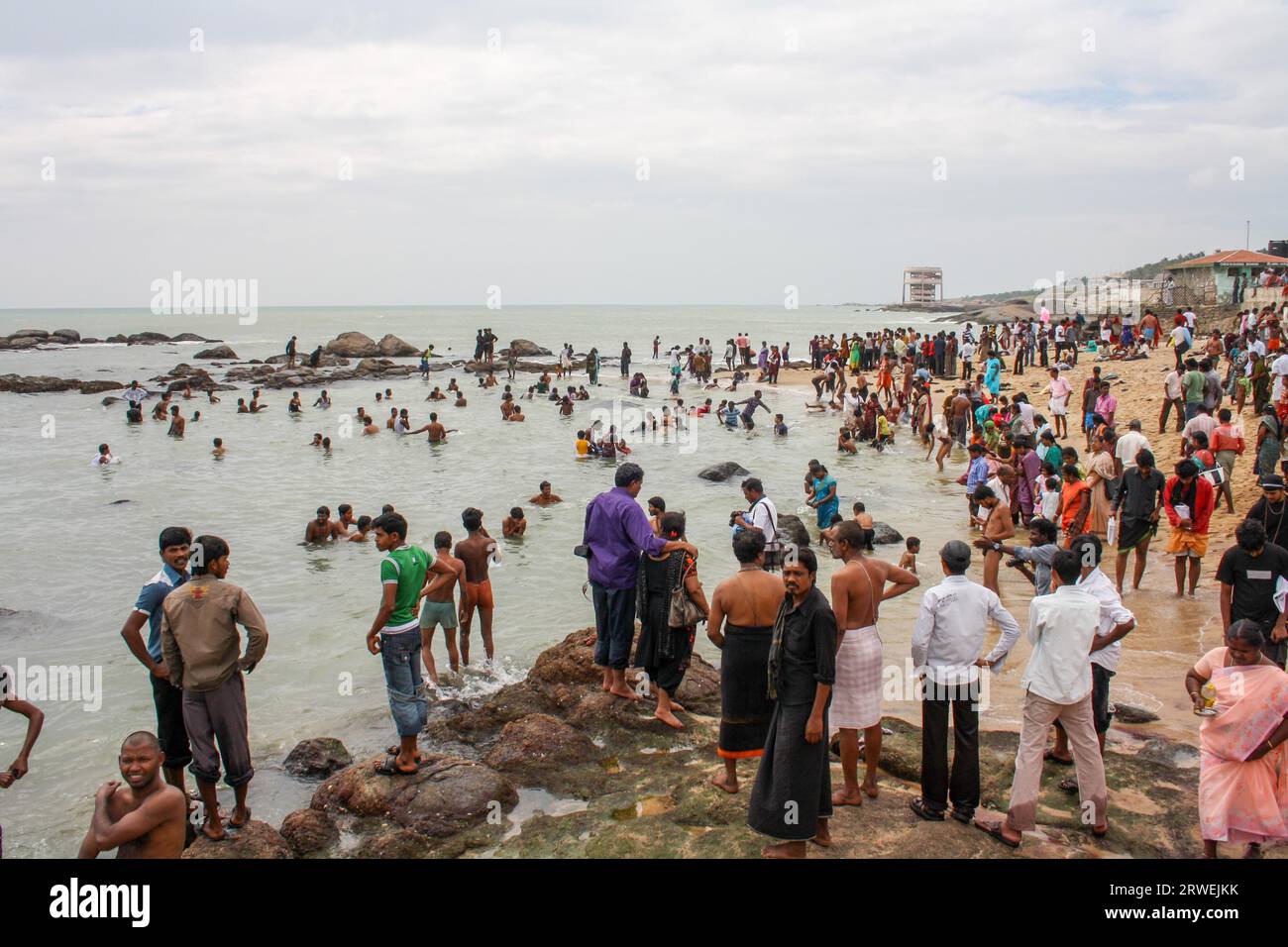 Kanyakumari, India, January 16, 2011: Group of people bathing at the ...