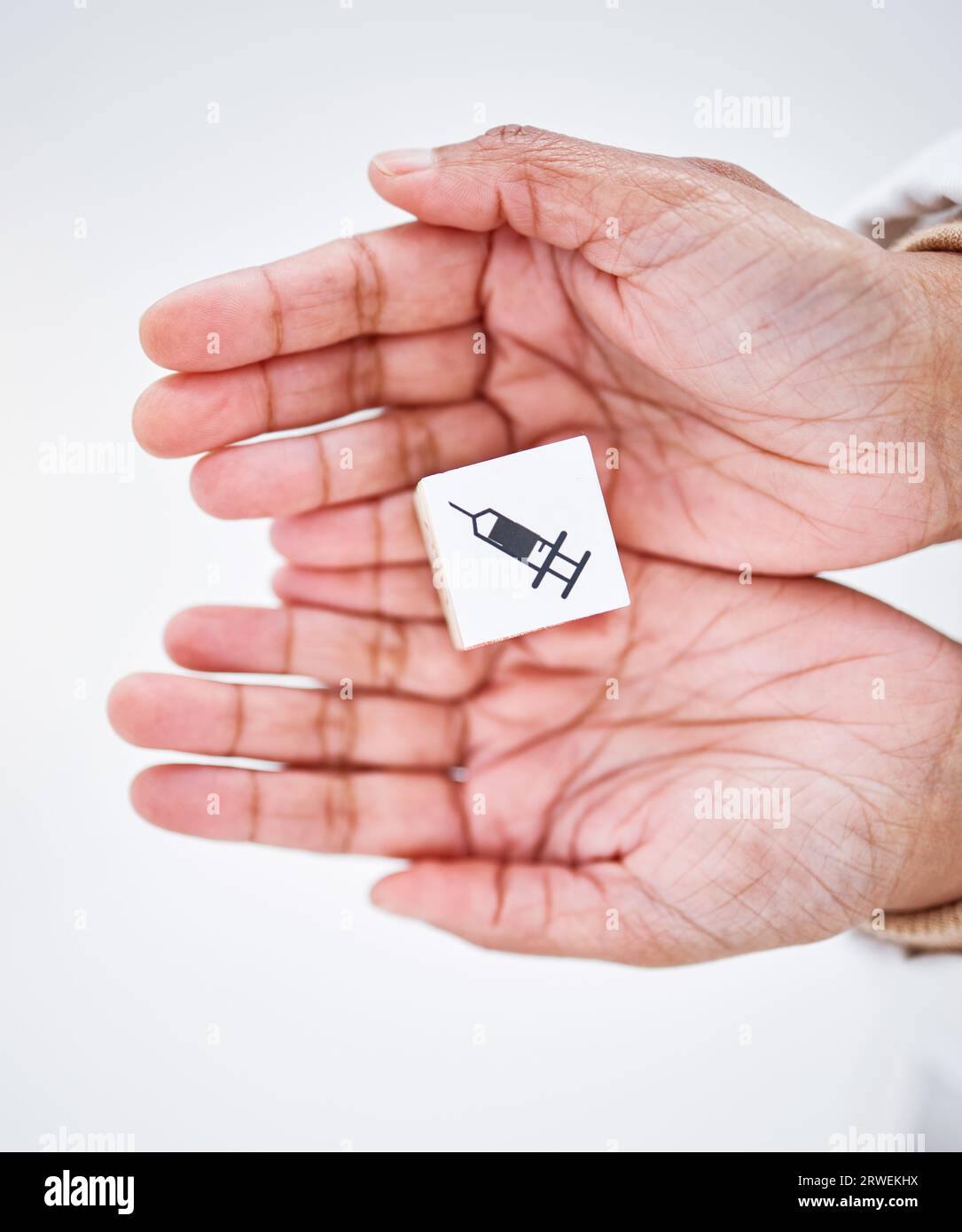 Healthcare, wooden block and hands with injection sign for medical ...